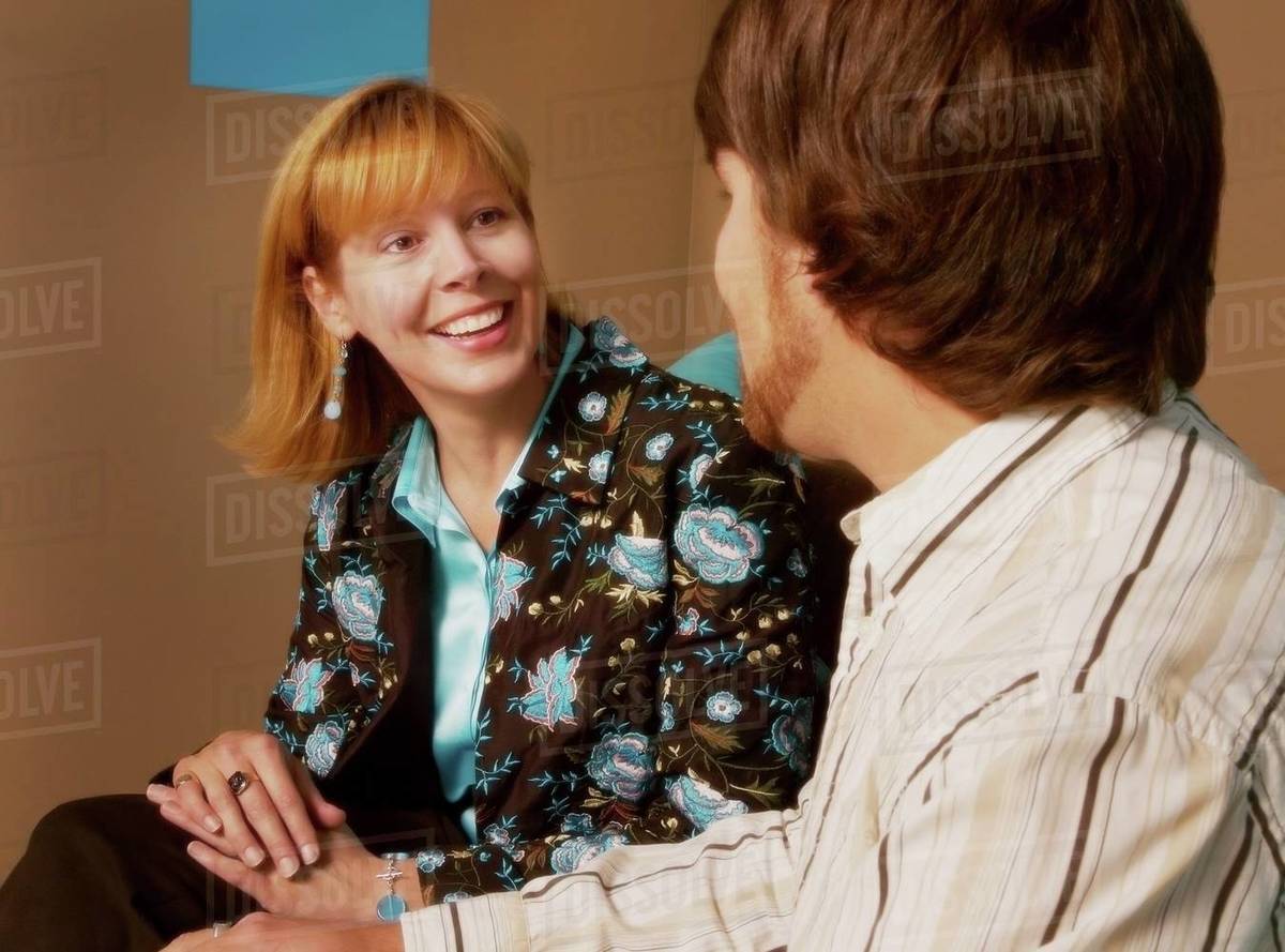 Couple Sharing Conversation - Stock Photo - Dissolve