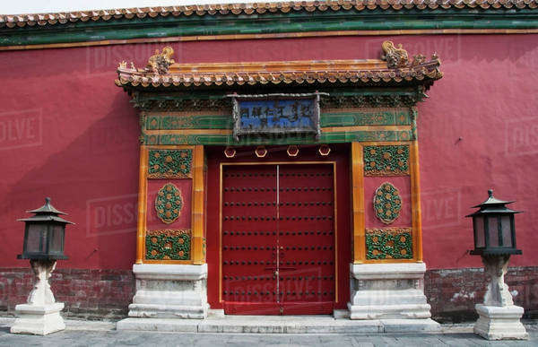 A Building With Red Walls And A Colourful And Ornate Door Frame ...