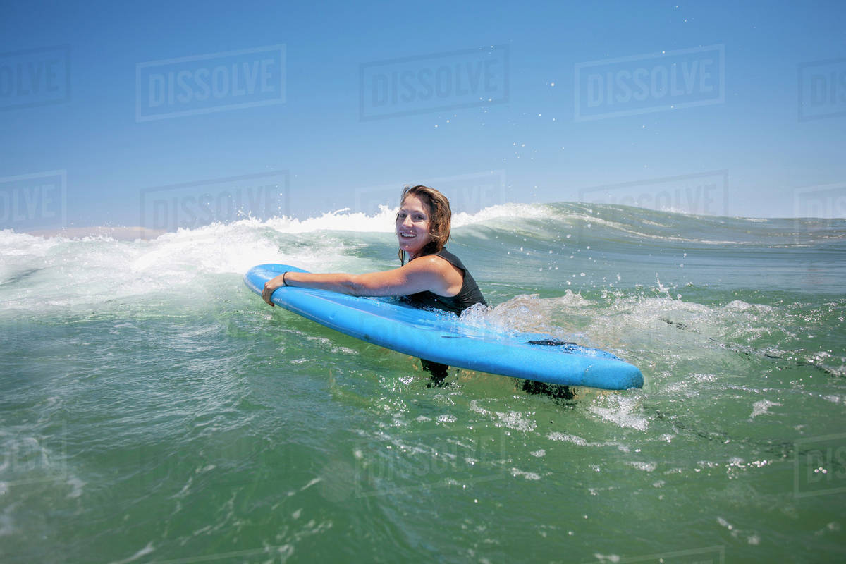 A woman with a bodyboard at hermosa beach;California united states of ...