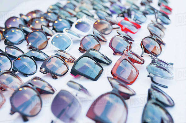 Sunglasses on display in a row;Chiang mai thailand - Stock Photo - Dissolve