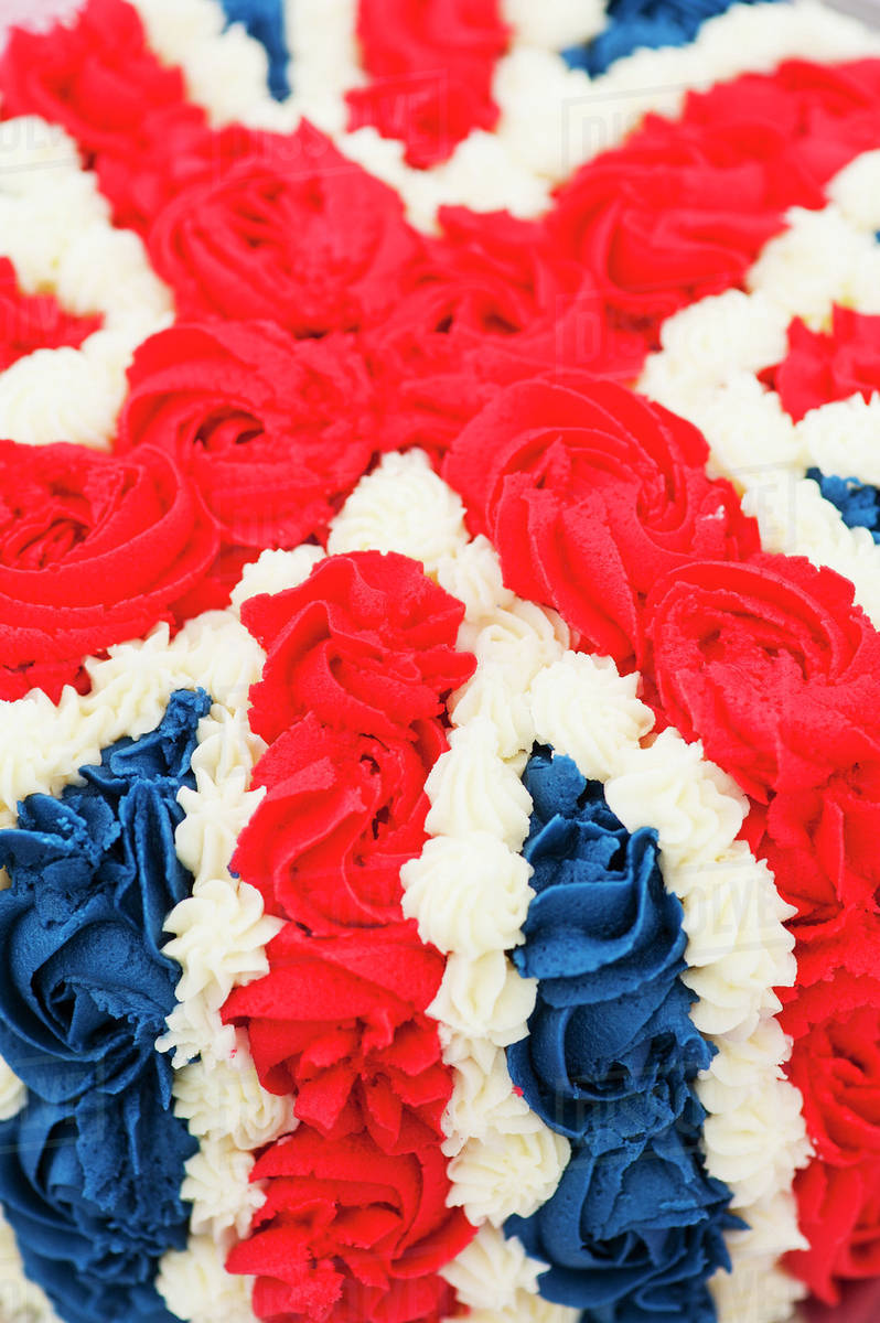 Icing on cake in union jack design as part of village celebration of ...