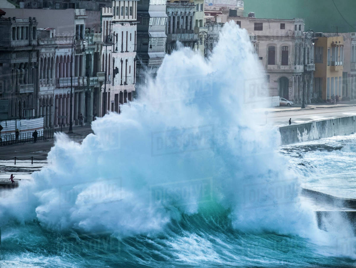 The north wind blows a large wave on to the Malecon in Havana, Cuba ...