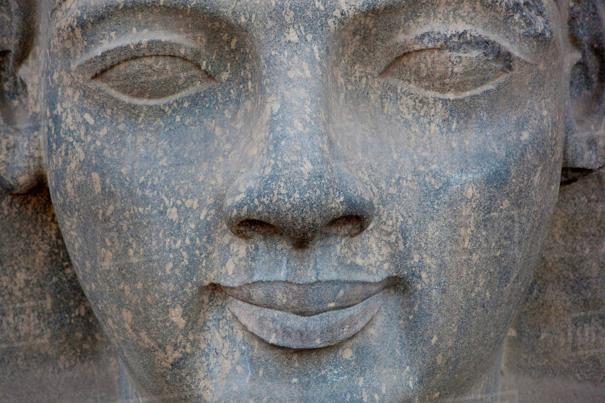 Sculptured face of Ramesses II in Luxor temple; Karnak, Egypt - Royalty ...