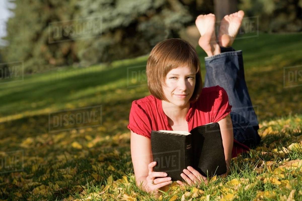 Female Reading Outdoors - Royalty-free Stock Photo | Dissolve