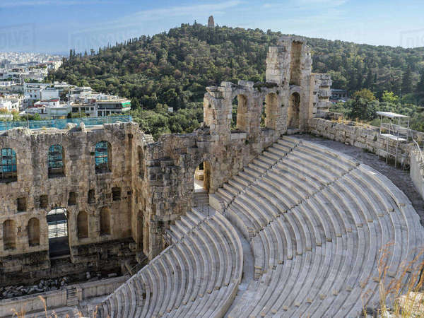 Amphitheatre seating and ruined stone walls at the Acropolis of Athens ...