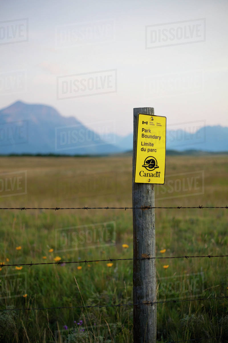 A Parks Canada Sign For A Park Boundary In Waterton Lakes National Park ...