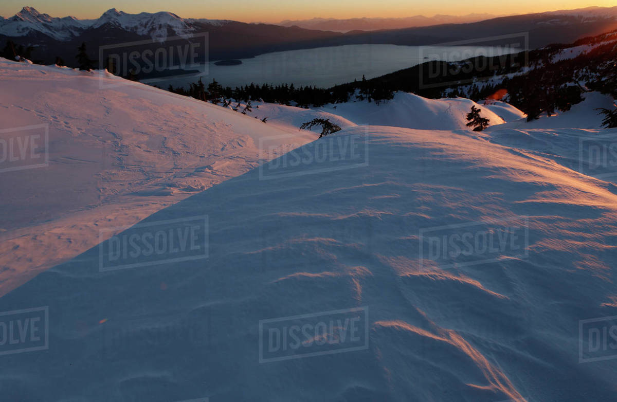 The Taku winds blow icy ridges framing an overlook of the Inside ...
