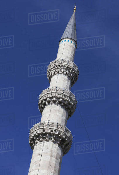 Minaret on an Islamic mosque; Istanbul, Turkey - Stock Photo - Dissolve