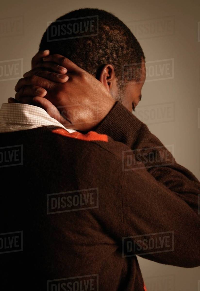 Man With Hands On His Neck - Royalty-free Stock Photo | Dissolve