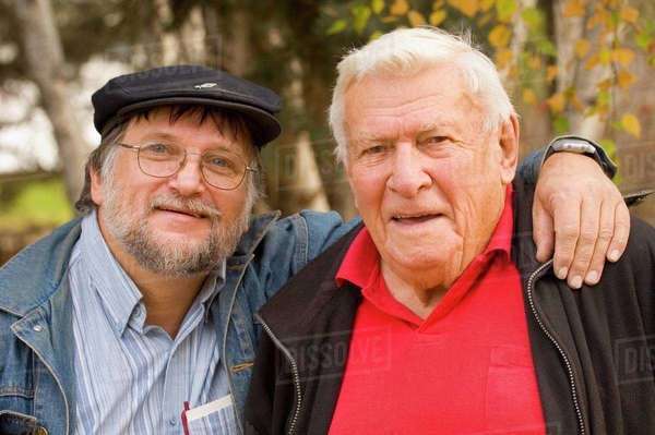 Portrait Of Two Men - Stock Photo - Dissolve