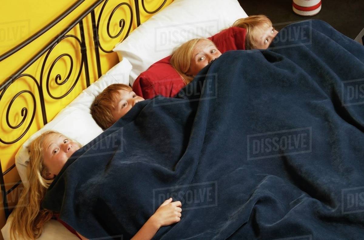 A Group Of Girls Having A Sleepover - Stock Photo - Dissolve