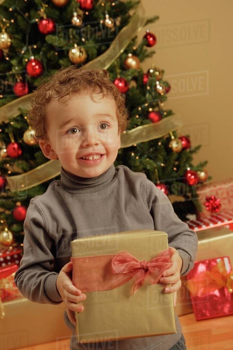 Child With Present - Royalty-free Stock Photo | Dissolve