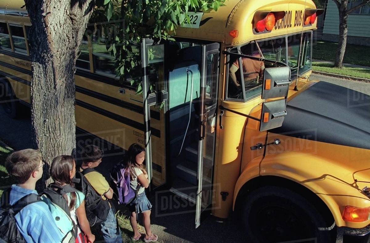 Children Loading A School Bus - Royalty-free Stock Photo | Dissolve