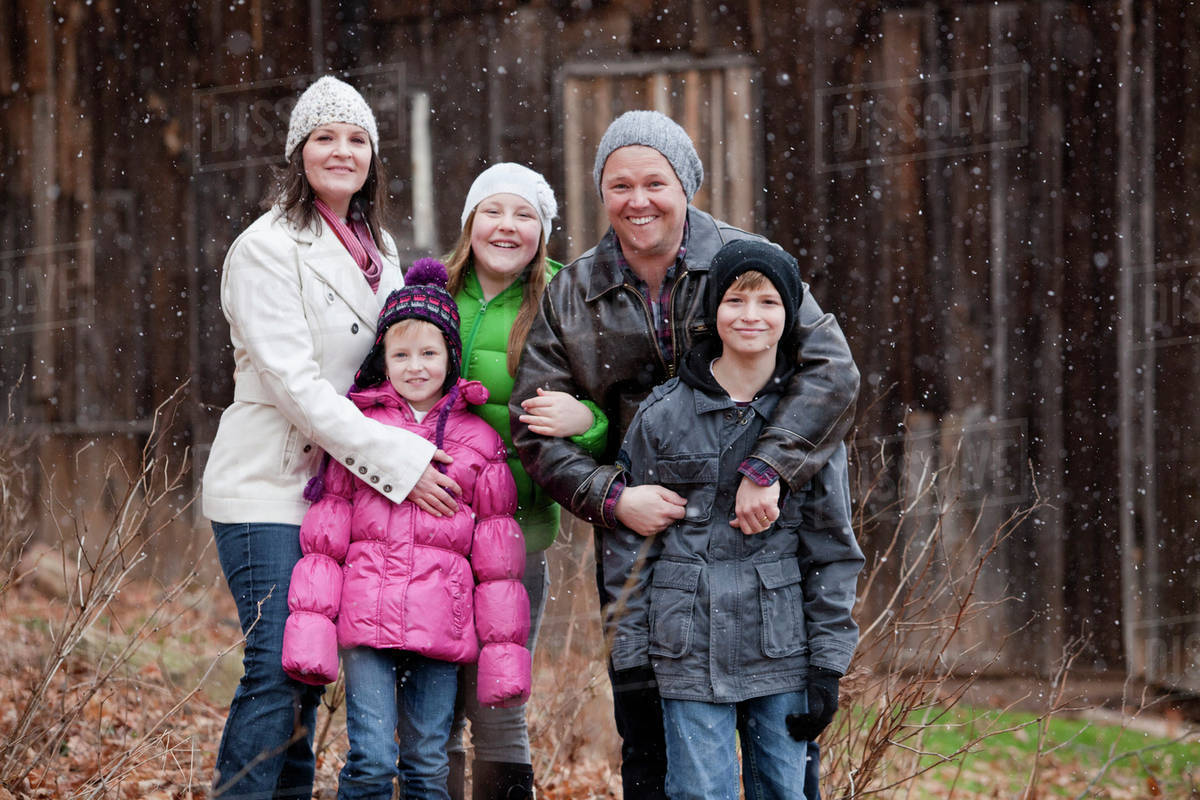 Portrait Of A Family In A Snowfall; Grimsby, Ontario, Canada - Royalty ...