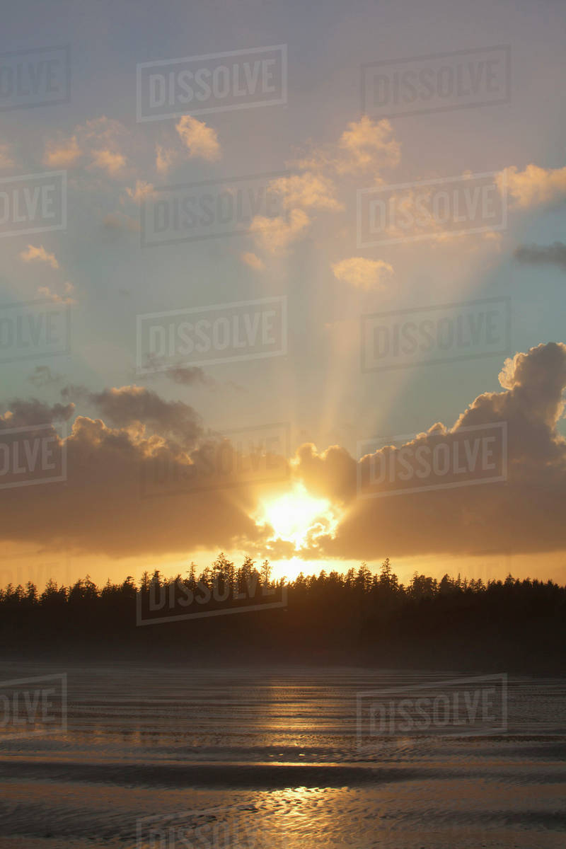 Clouds Are Backlit By The Sun At Sunset At Incinerator Rock Area Of ...