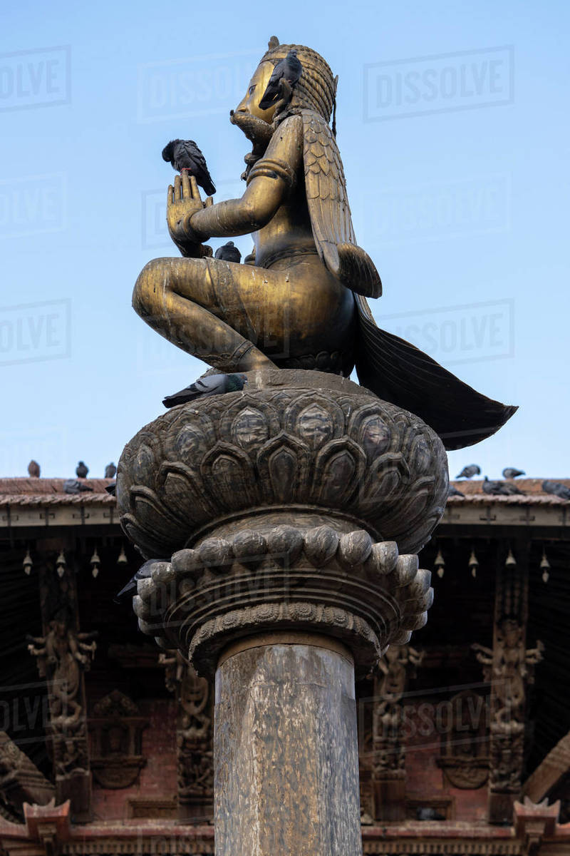 Column statue of Garuda at Durbar Square in the old city of Patan (or ...