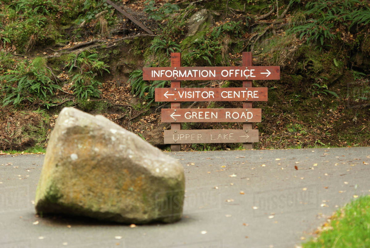 A Wooden Directional Sign For An Information Office And Visitor Centre ...