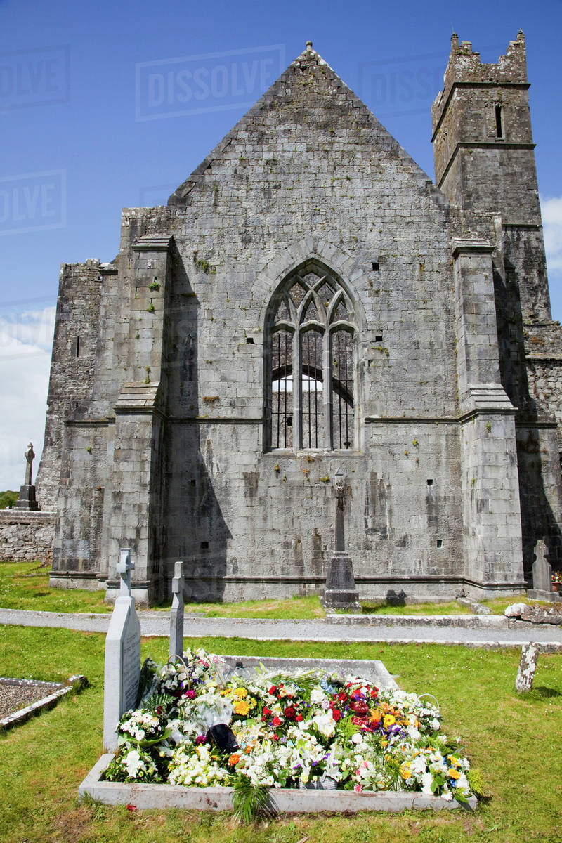 A Small Flower Garden Beside A Burial Plot In A Cemetery At Quin Abbey ...