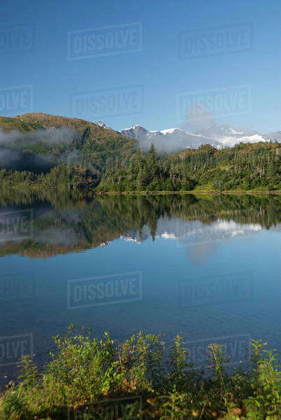 Shrode lake with low lying fog;Prince william sound alaska united ...