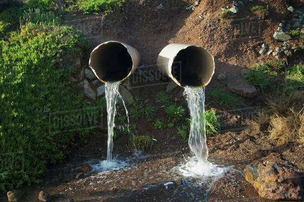 Drainage pipes spilling out water;Marin headlands california united ...