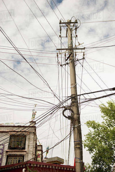 Pole overloaded with power lines;Lhana xizang china - Royalty-free ...