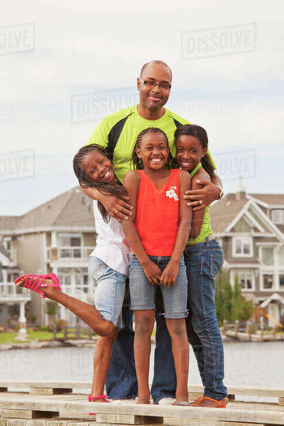 A Father And Three Daughters Spending Quality Time Together; Edmonton ...