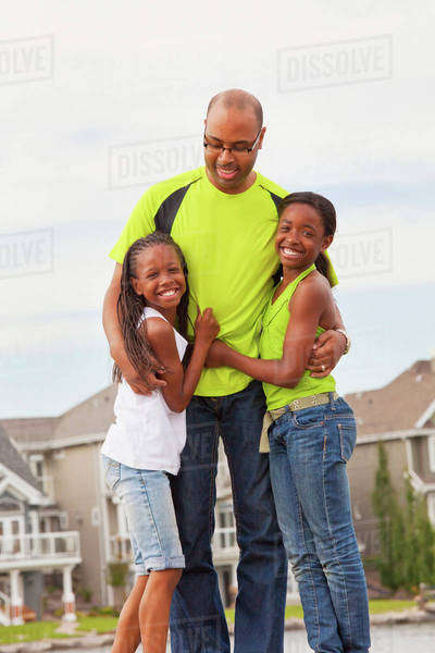 A Father And Two Daughters Spending Quality Time Together; Edmonton ...