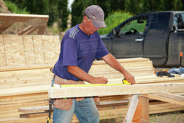Tradesman Working On Framing For New Home Construction; St. Albert ...