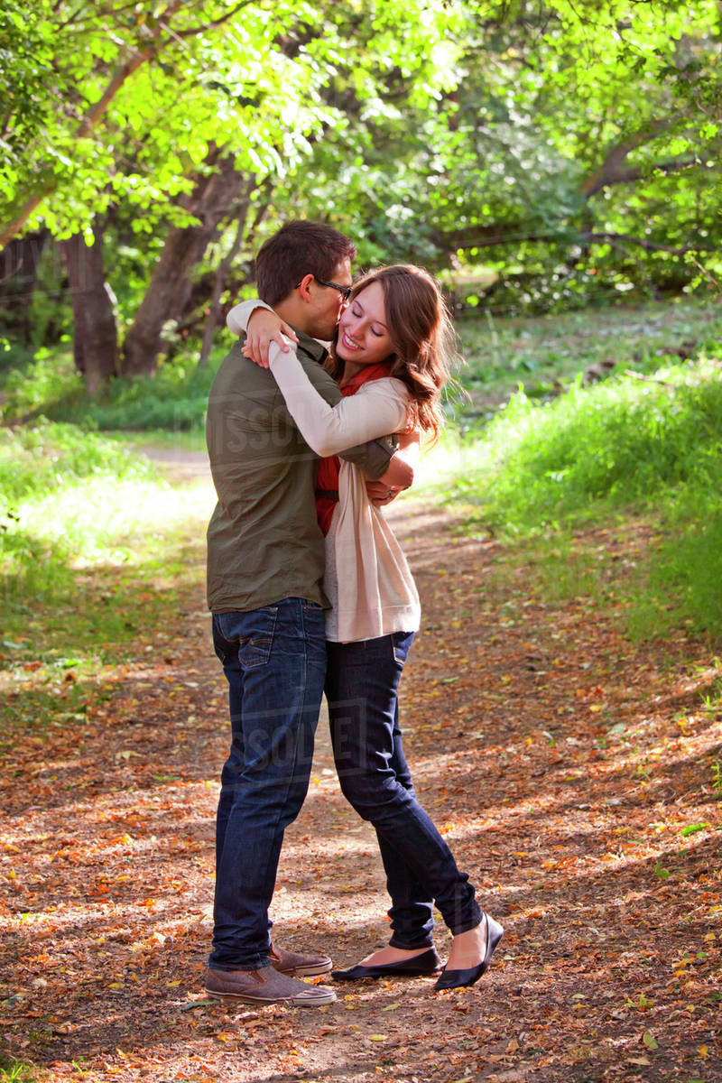 Newlywed Couple Spending Time Together In A Park In Autumn; Edmonton ...
