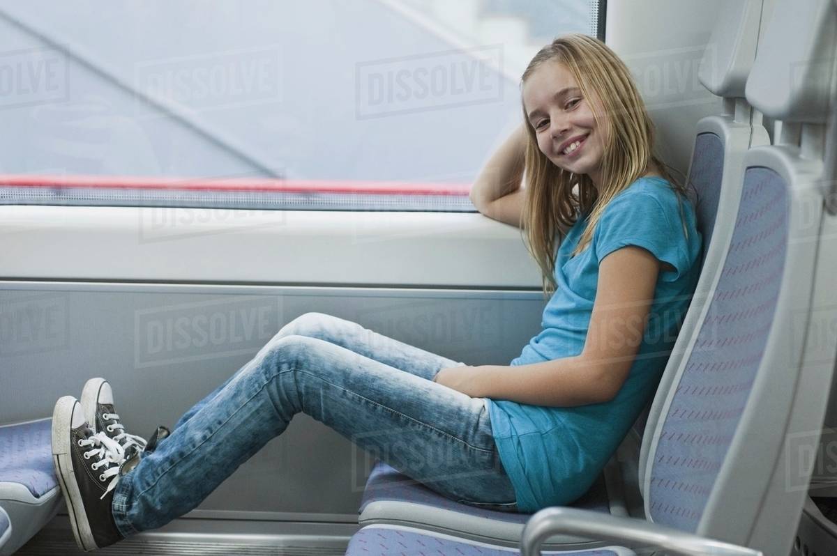 Girl Sitting On Train Woman Sitting On A Train · Free Stock Photo