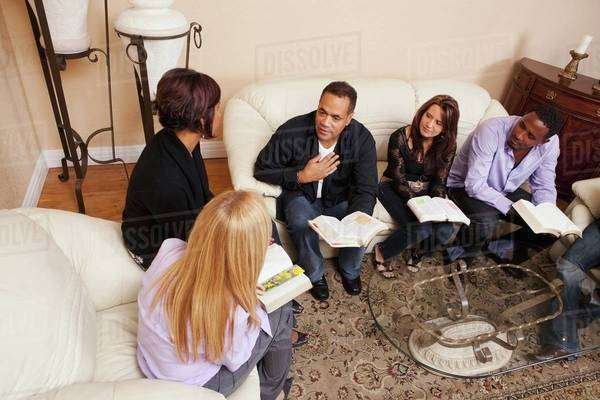 Group Of Adults In A Home Bible Study - Royalty-free Stock Photo | Dissolve