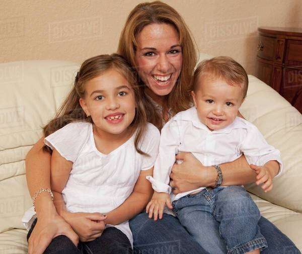 Portrait Of A Mother With Her Two Children - Royalty-free Stock Photo ...