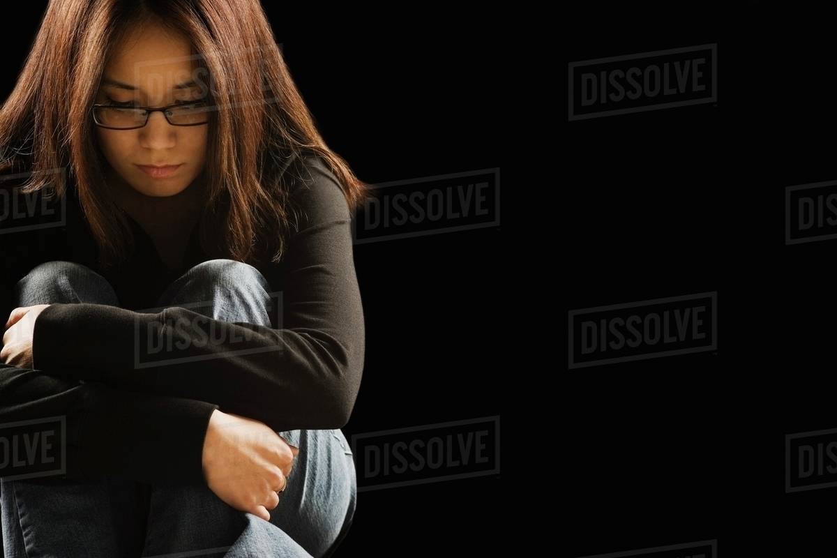 A Young Woman Looking Sad - Royalty-free Stock Photo | Dissolve