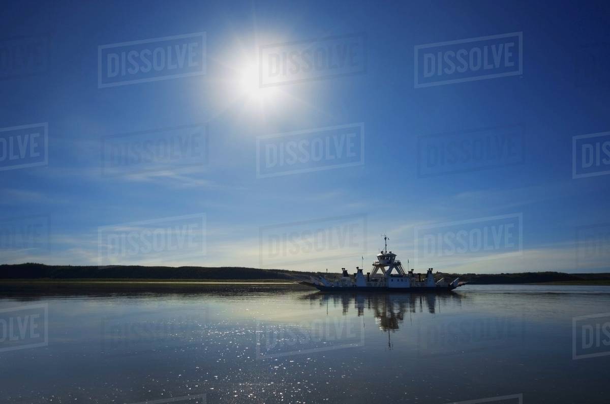 Northwest Territories, Canada; Ferry Crossing The Mackenzie River ...