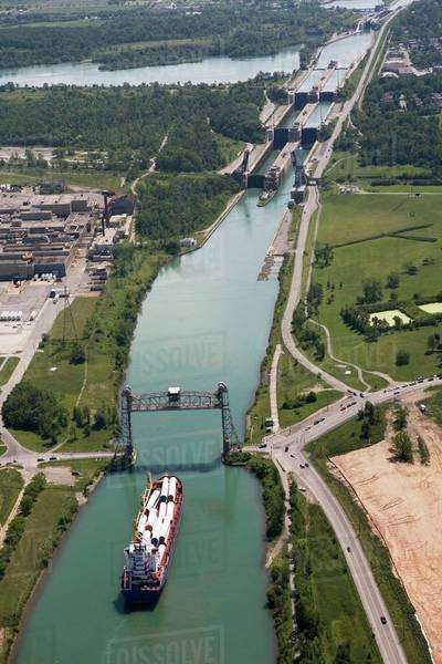 Welland Canal With A Ship, Bridge And Locks; Thorold, Ontario, Canada ...
