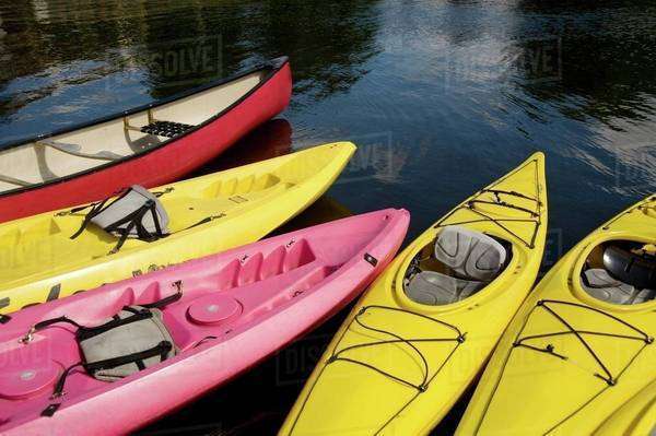Muskokas, Ontario, Canada; Empty Kayaks In Water - Royalty-free Stock ...