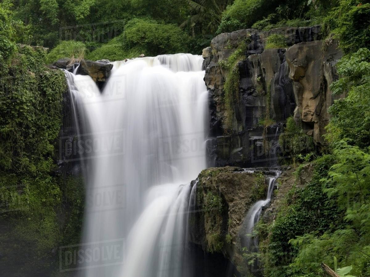 Bali, Indonesia, Asia; Waterfall - Stock Photo - Dissolve