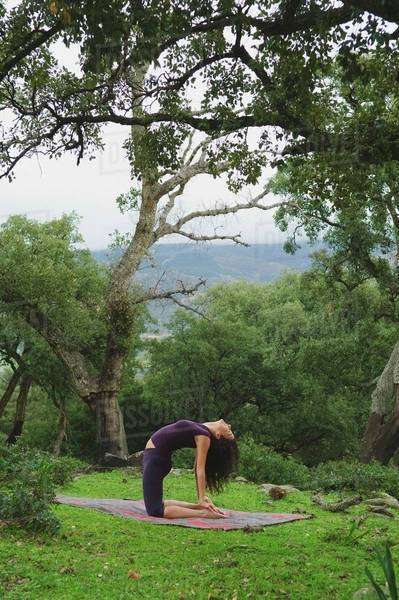 Woman Stretching In Nature - Royalty-free Stock Photo | Dissolve