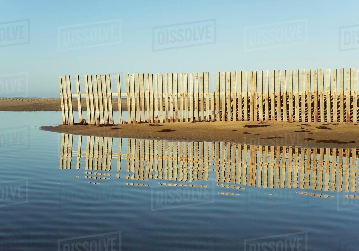 Wooden Fence On The Beach - Royalty-free Stock Photo | Dissolve
