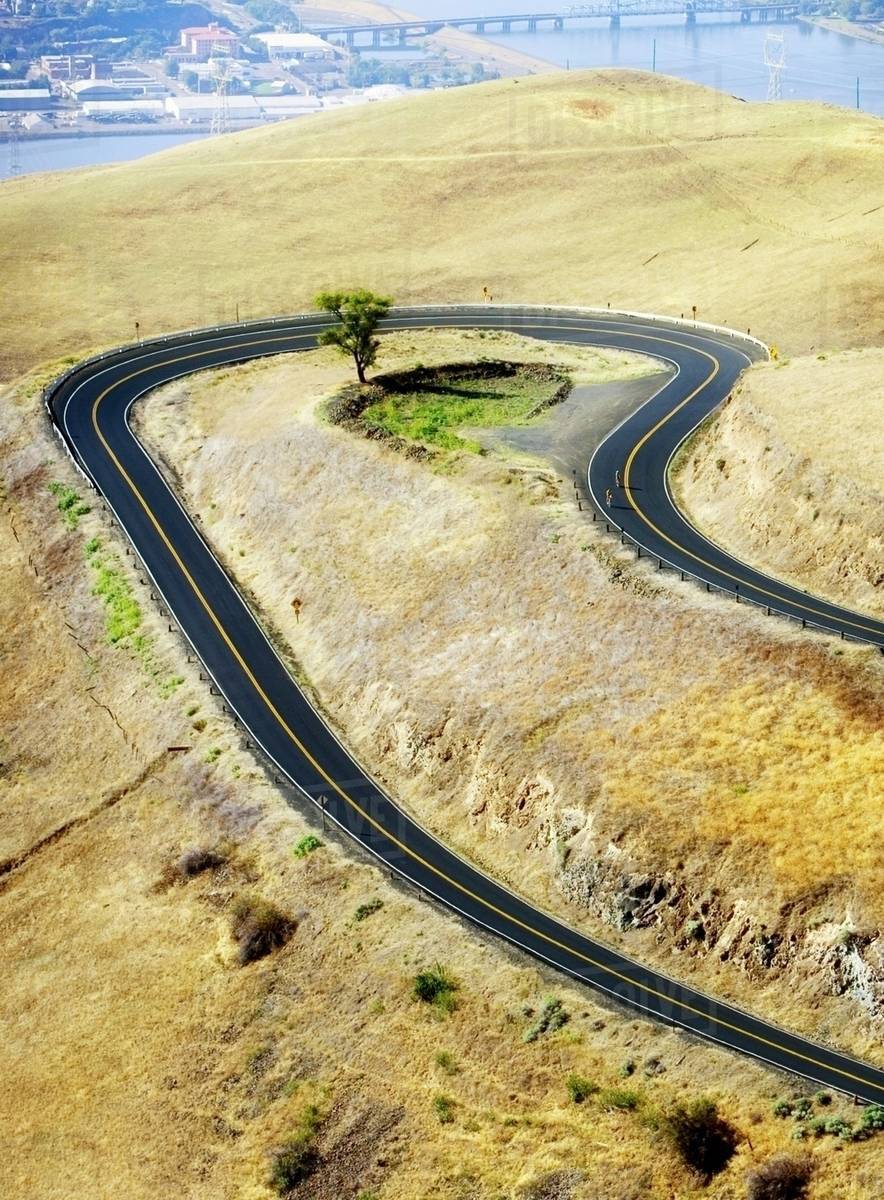 Road On A Hill - Royalty-free Stock Photo | Dissolve