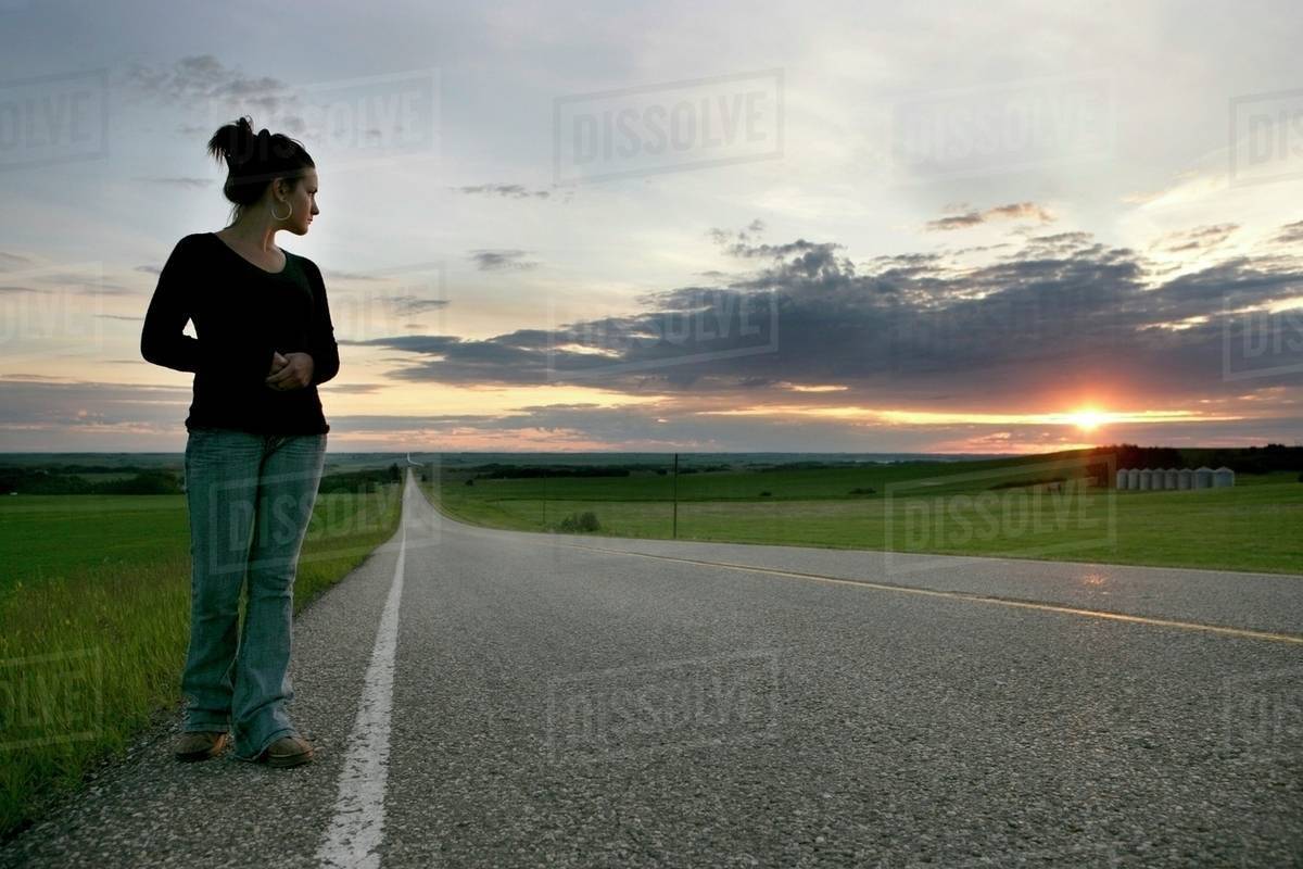 Woman Beside The Road - Royalty-free Stock Photo | Dissolve
