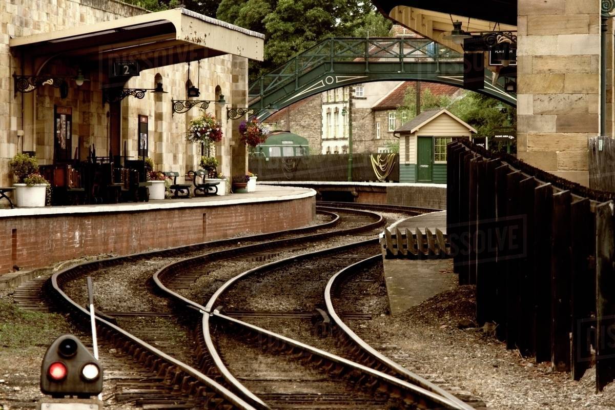 An Old-Fashioned Train Station And Tracks - Royalty-free Stock Photo ...