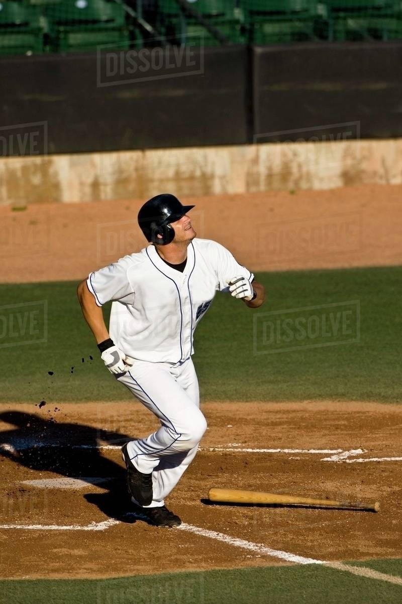 Baseball Player Running - Stock Photo - Dissolve
