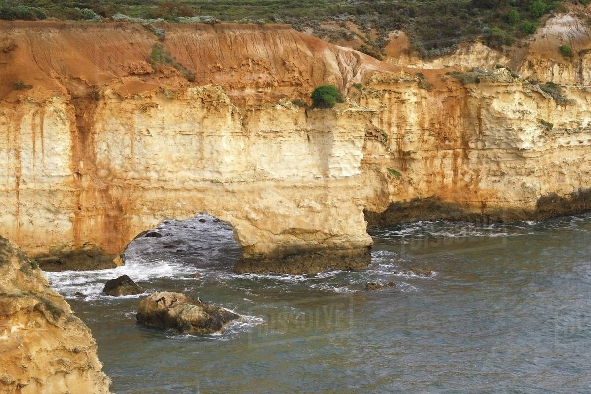 Sea Rock Stack Arch Near 12 Apostles, Australia - Stock Photo - Dissolve
