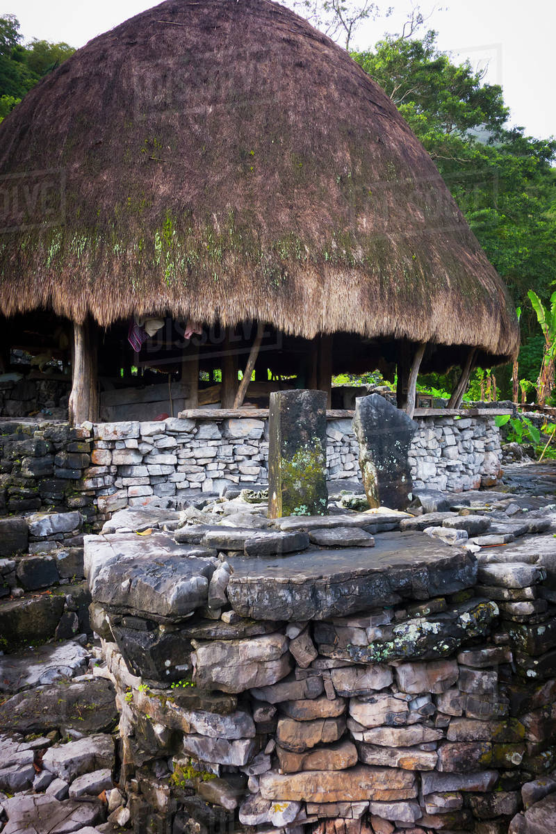 Traditional Timorese house at Liurai Village; Timor-Leste - Royalty ...