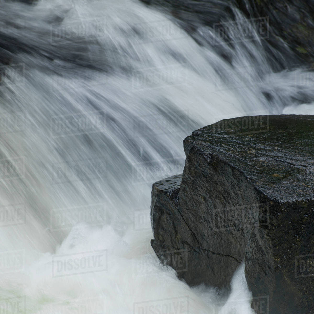 Water rushing over rocks in a river; Kenora, Ontario, Canada - Royalty ...