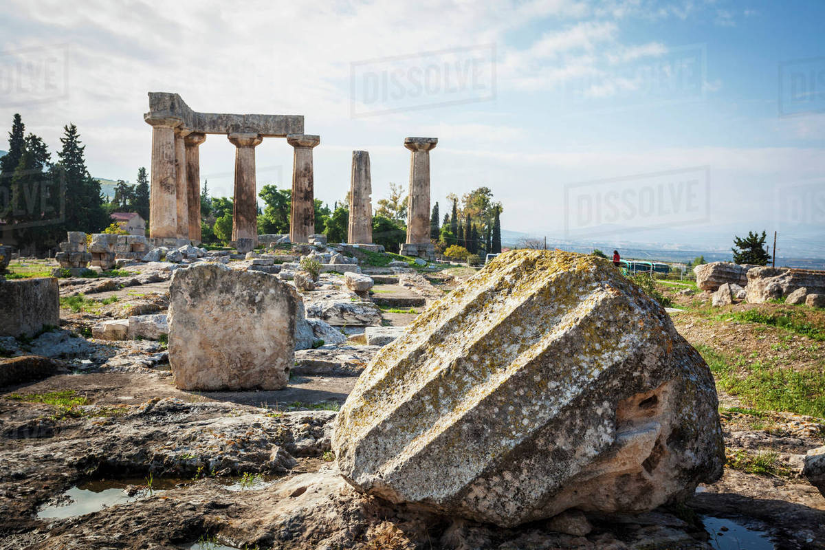 Stone Ruins With Columns And A Boulder; Corinth, Greece - Royalty-free ...