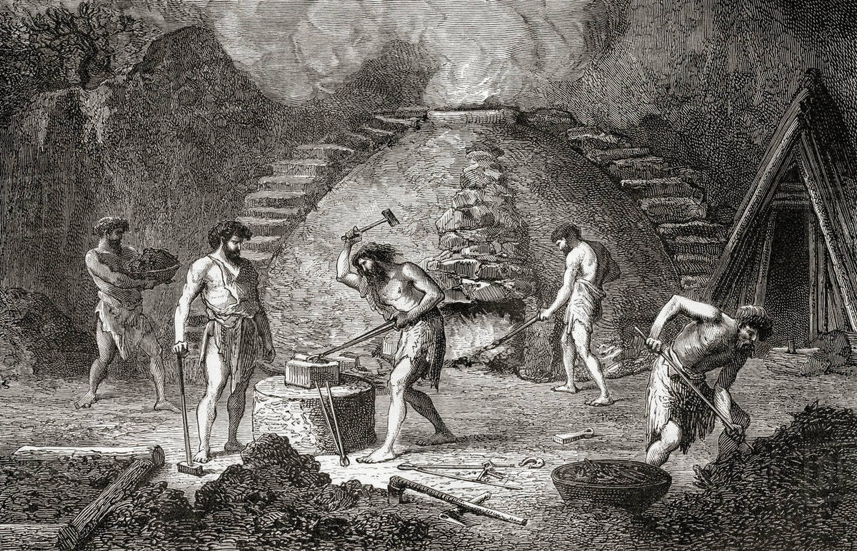 Men working at a primitive furnace used for the extraction of iron ...