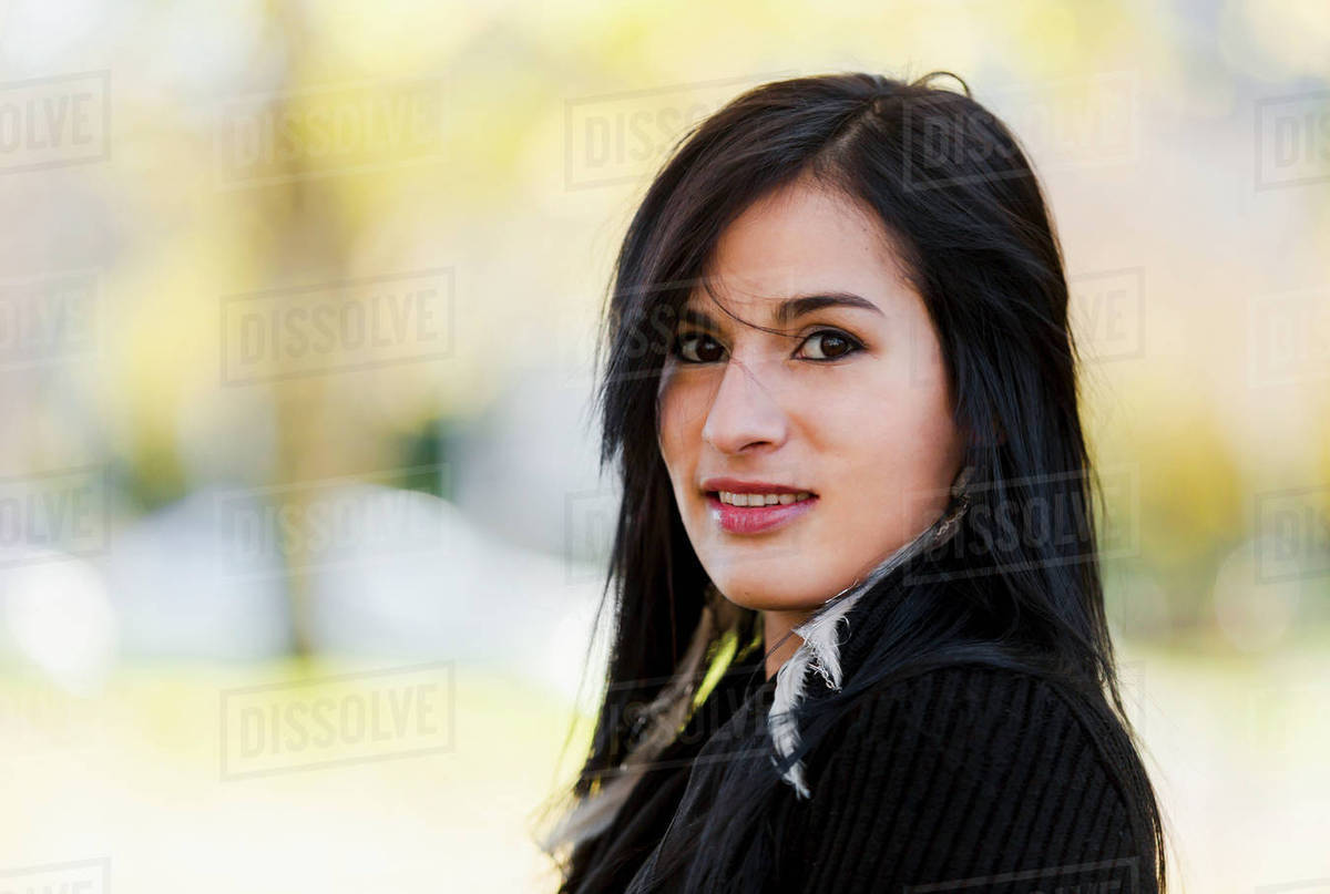 A Young Aboriginal Female Model Smiles And Looks At The Camera In A ...
