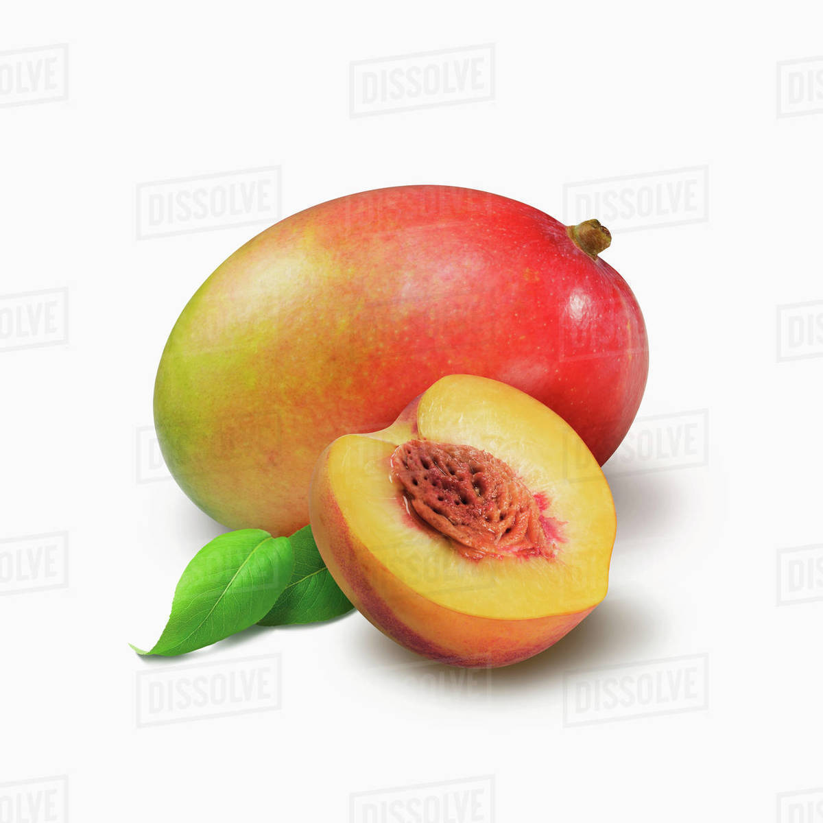 Mango And Half Of A Peach With Leaves On A White Background; Toronto ...